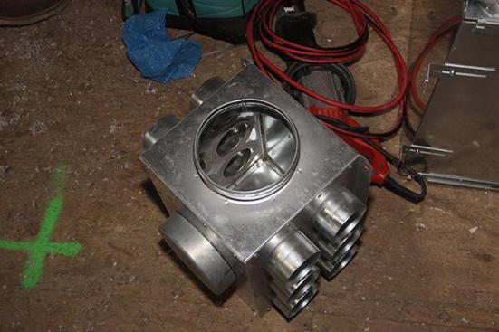 Installing an ERV in a Two-Family Passive House