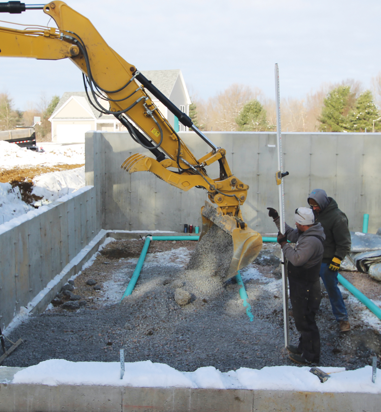 Pumping to Daylight: Foundation Drainage for a Low-Lying Site