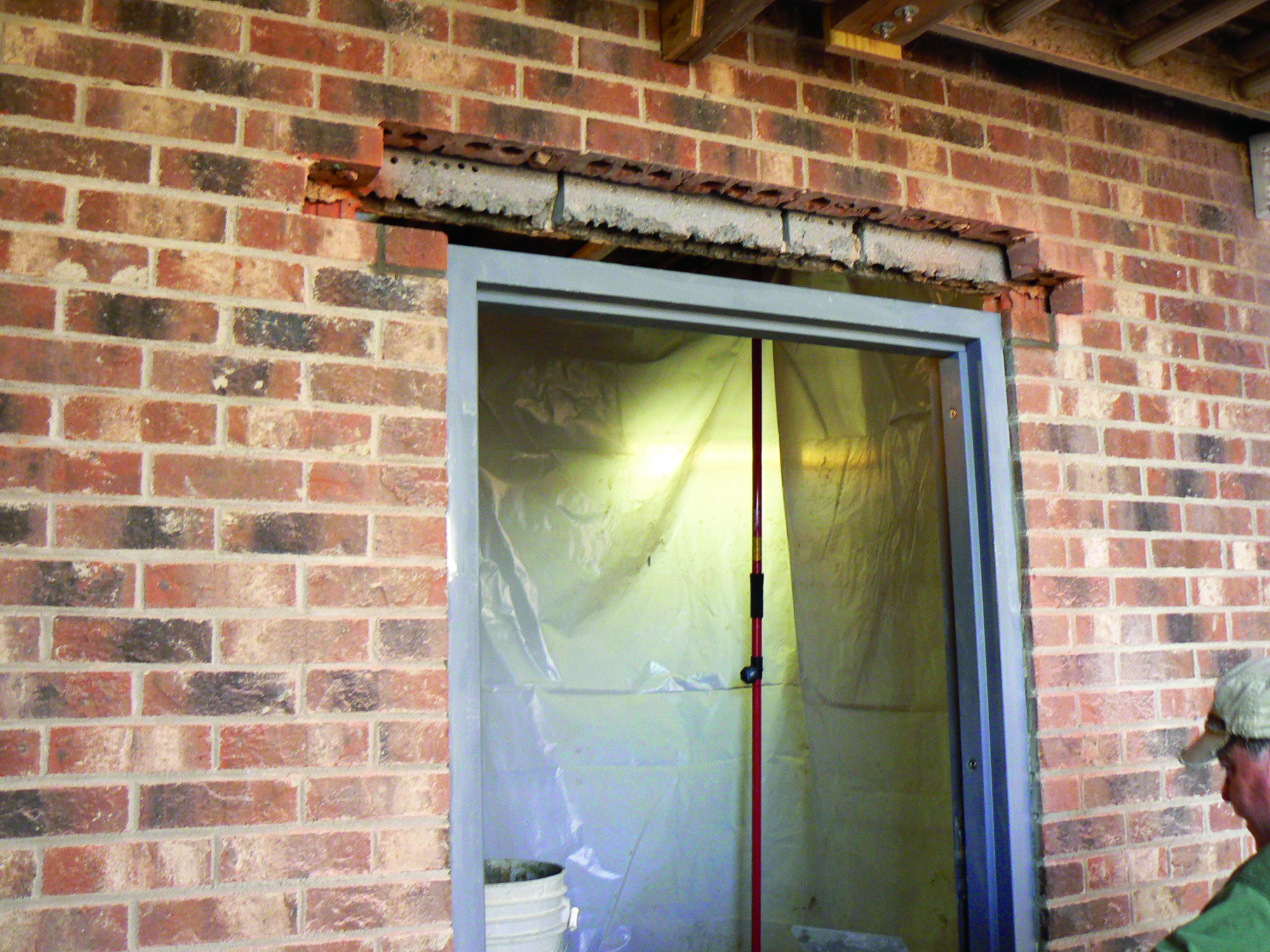 A Steel Door in a Brick Foundation