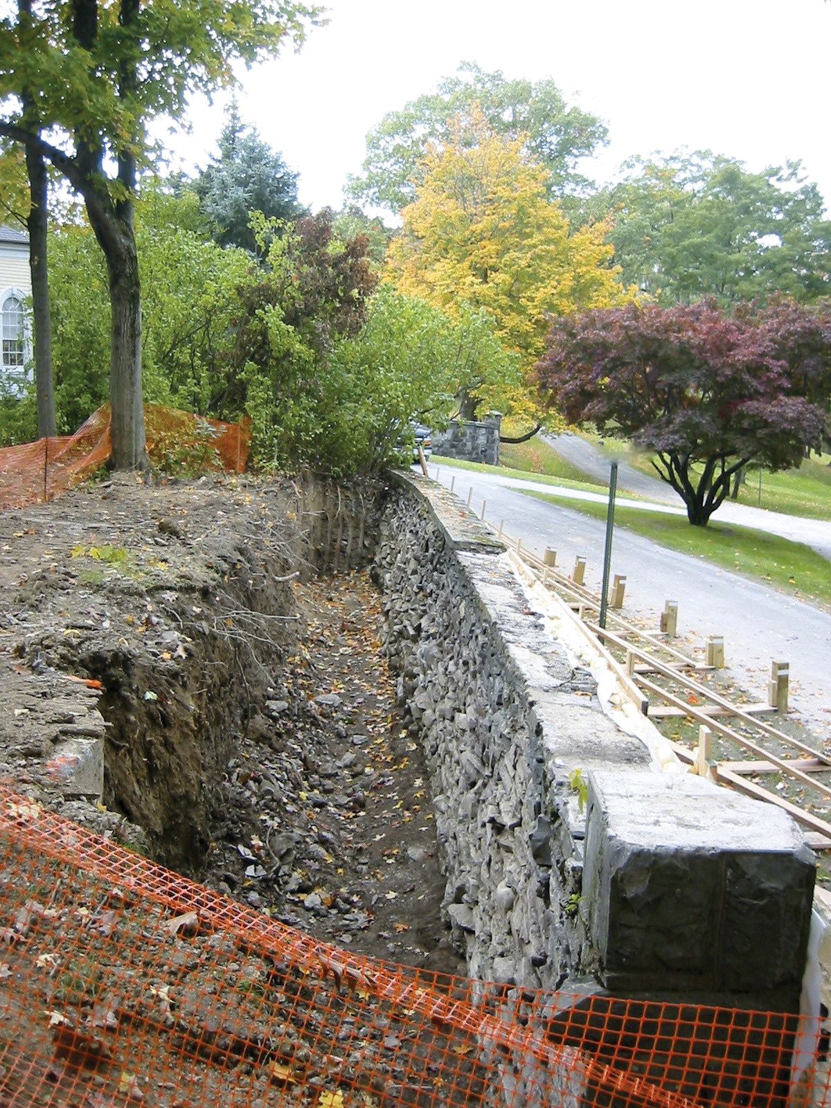 Straightening a Stone Wall With Steel Pins and Helical Tiebacks