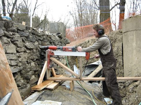Straightening a Stone Wall With Steel Pins and Helical Tiebacks