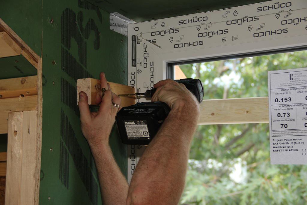 Setting Super-Windows in a Double Stud Wall