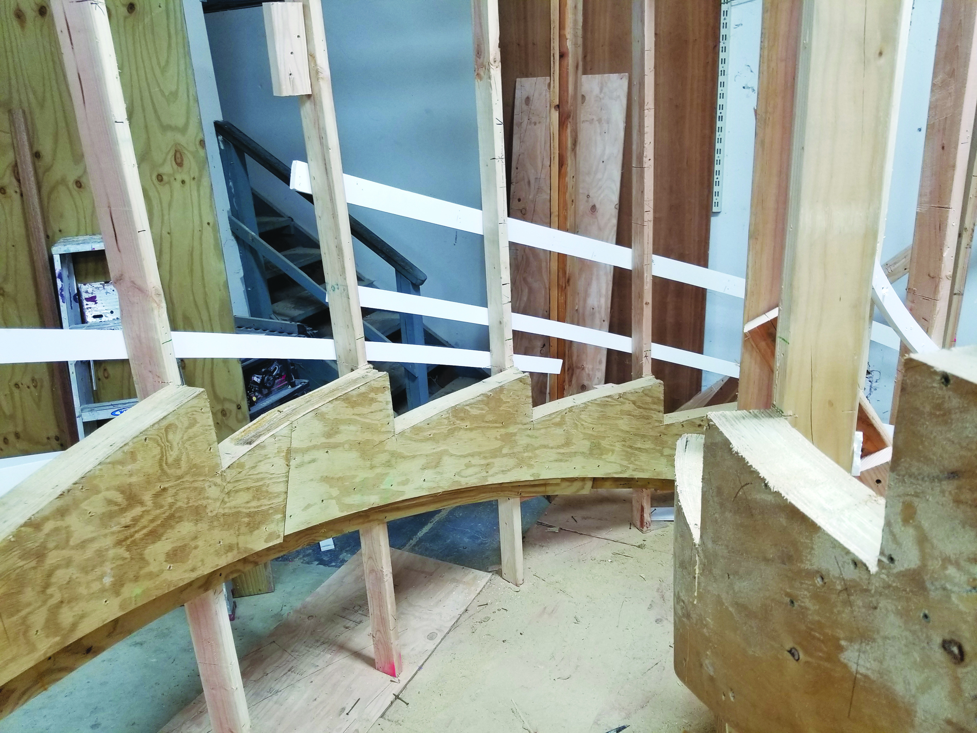 Elegant Elliptical Stairs for a Multilevel Deck