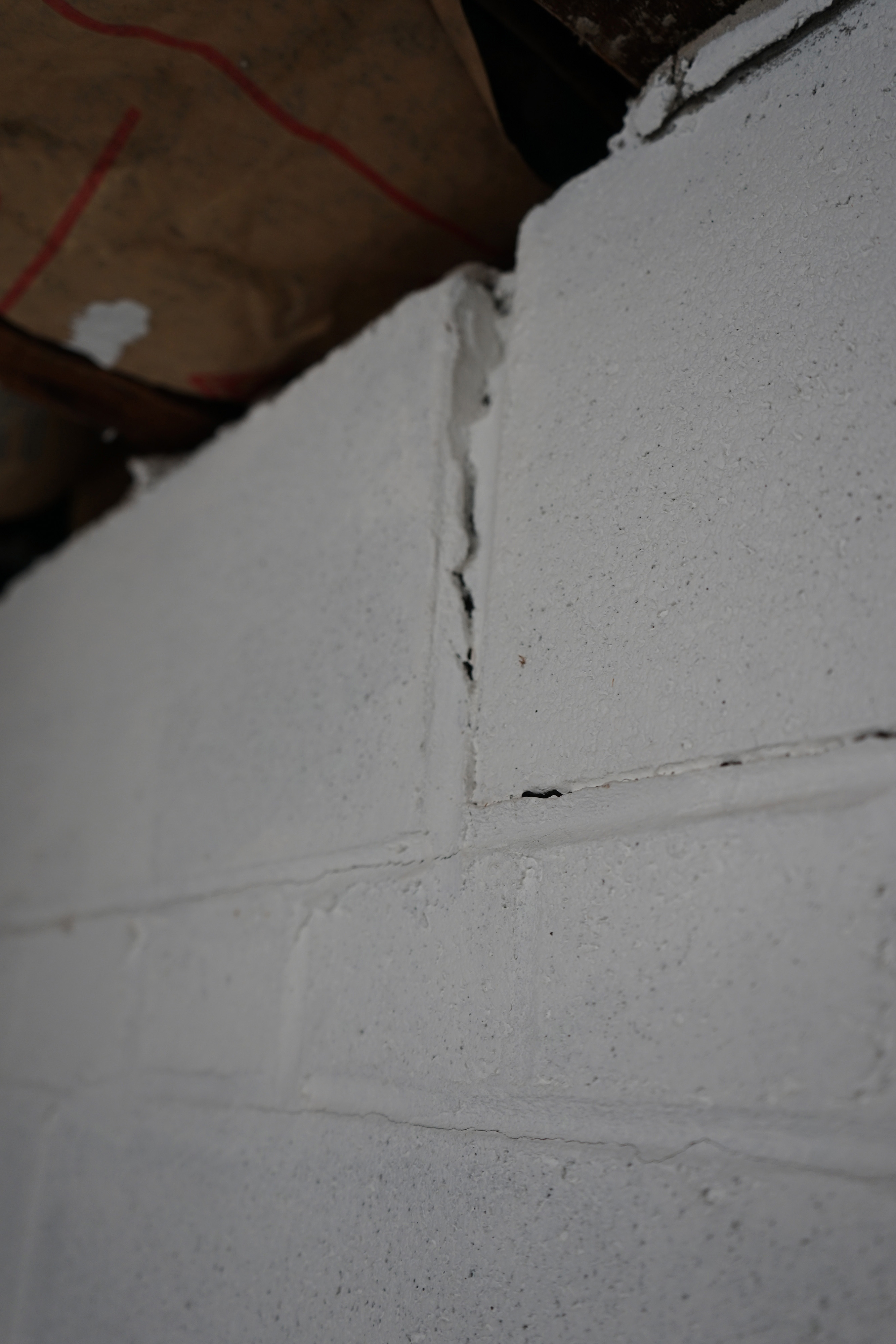 Reinforcing a Foundation with Structural Strapping