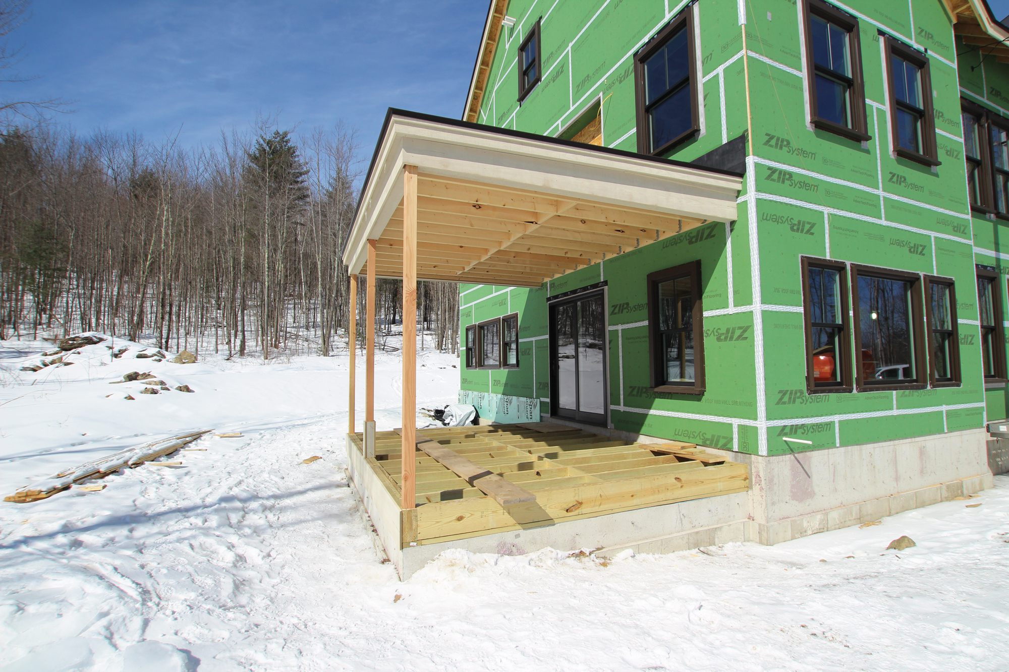 Screened Porch Under a Rooftop Deck
